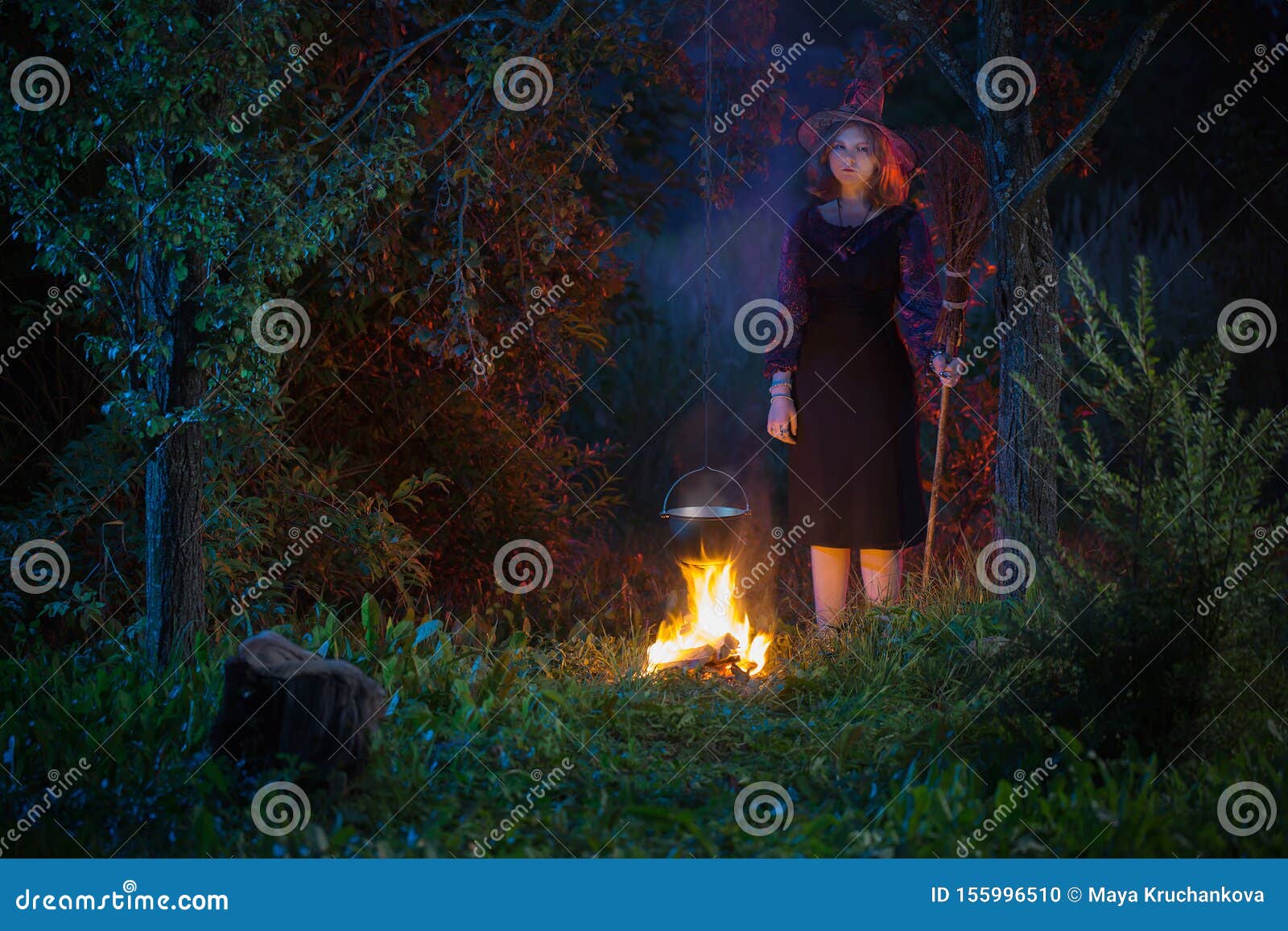 Young Witch by Fire in Night Forest Stock Photo - Image of hand, horror ...