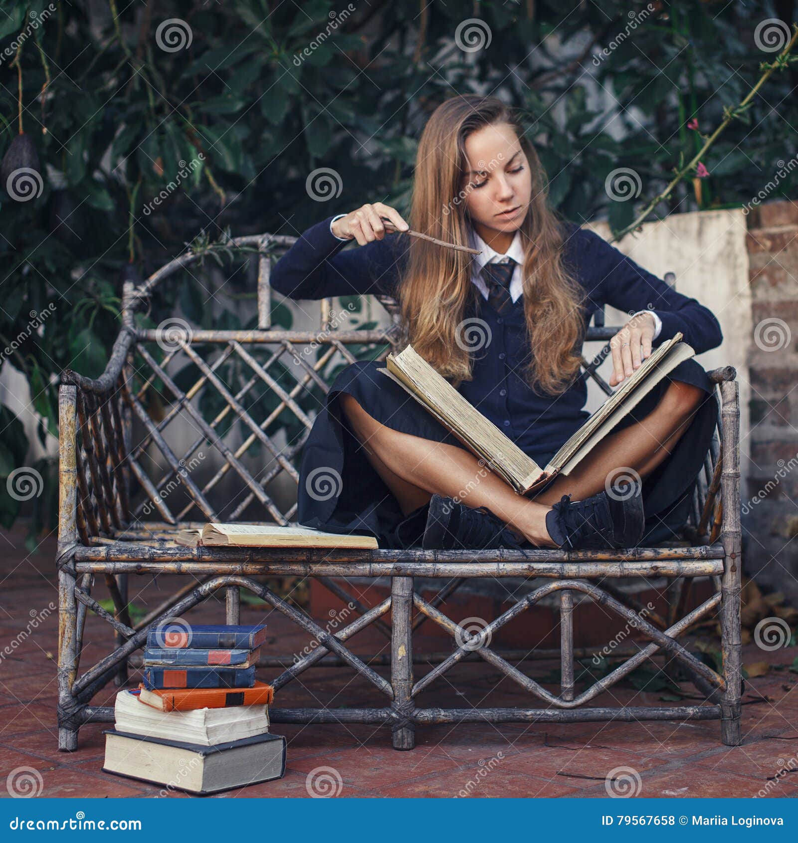 Young Witch Practicing with Magic Books. Helloween Stock Photo - Image ...