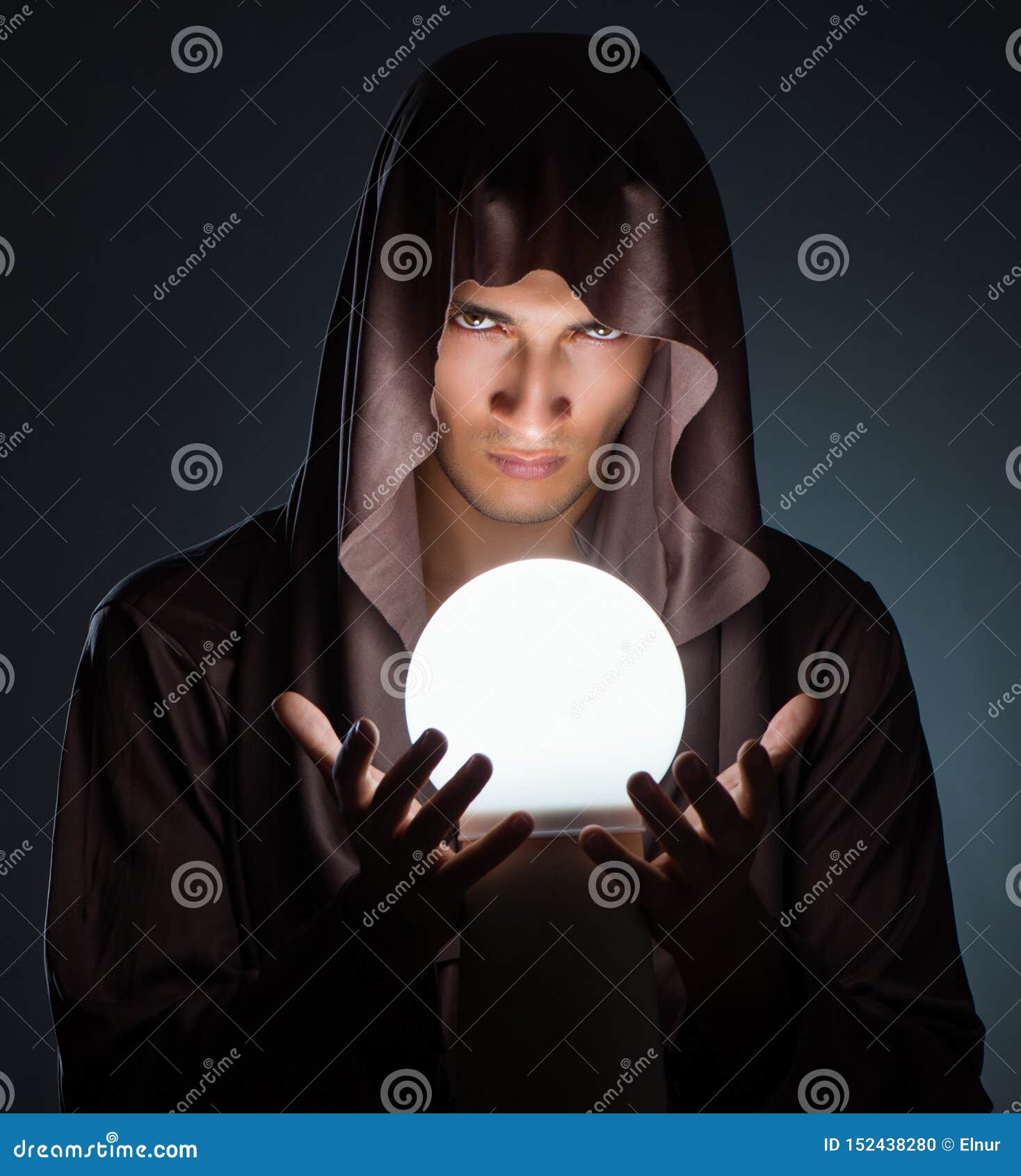 Young Wizard with Crystal Ball in Dark Room Stock Photo - Image of ...