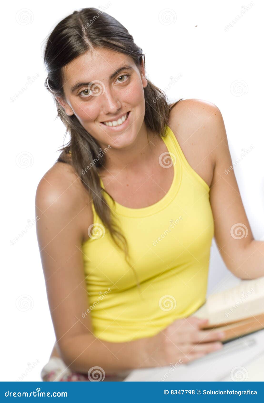 Young woman in yellow top stock photo. Image of book, welcoming - 8347798