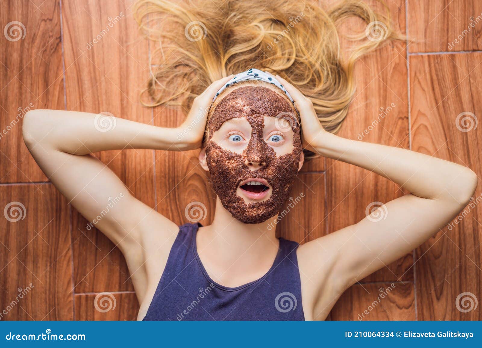 Young Woman with Algae Facial Mask Lying on the Floor Stock Photo ...