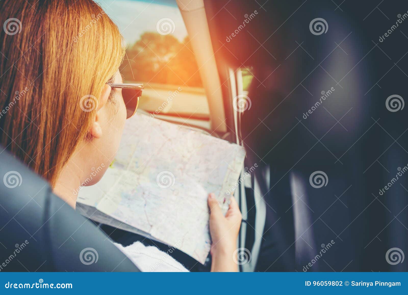Young Woman Alone Car Traveler with Map on Hatchback Car Stock Photo ...