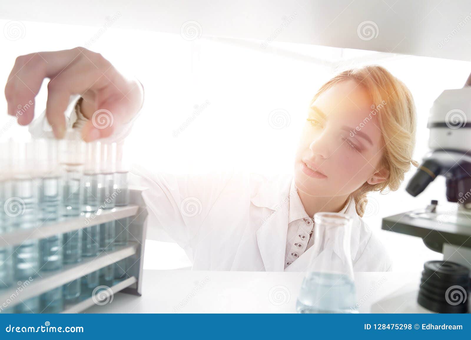 Young Woman Analyzing Samples in a Lab Stock Photo - Image of ...