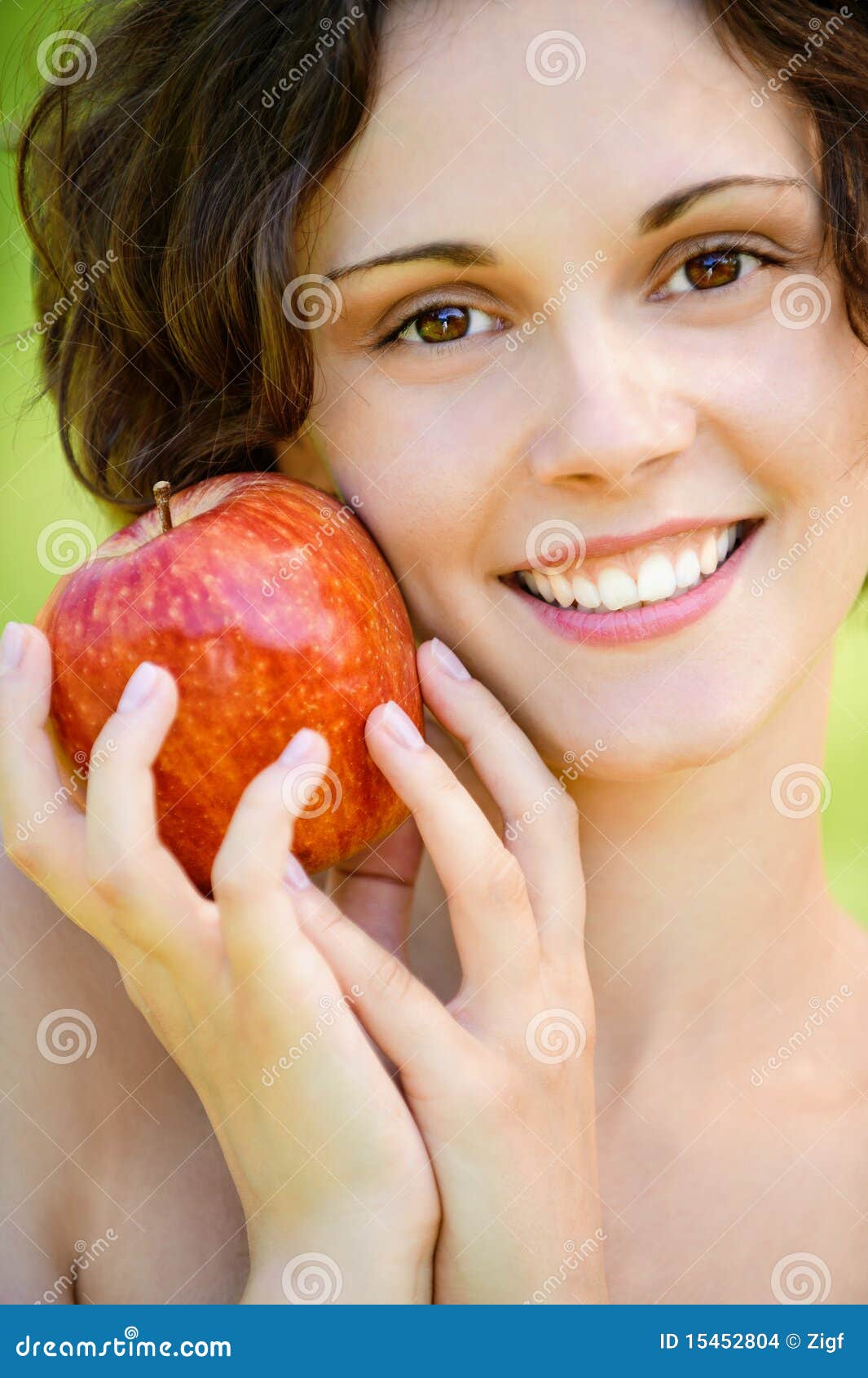 Young woman with apple stock photo. Image of face, apples - 15452804