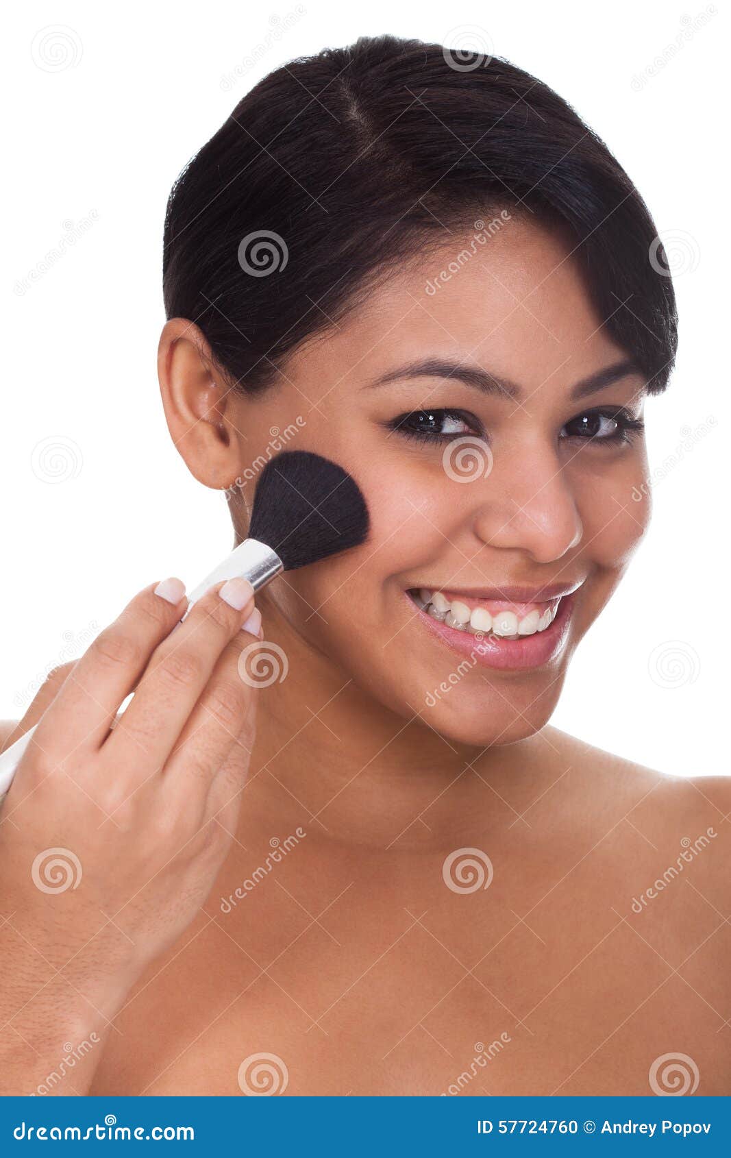 Young Woman Applying Blush stock photo. Image of cosmetic - 57724760