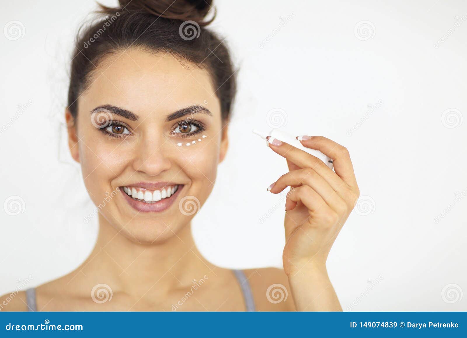 Young Woman Applying Eyes Cream On Perfect Skin Stock Image Image Of