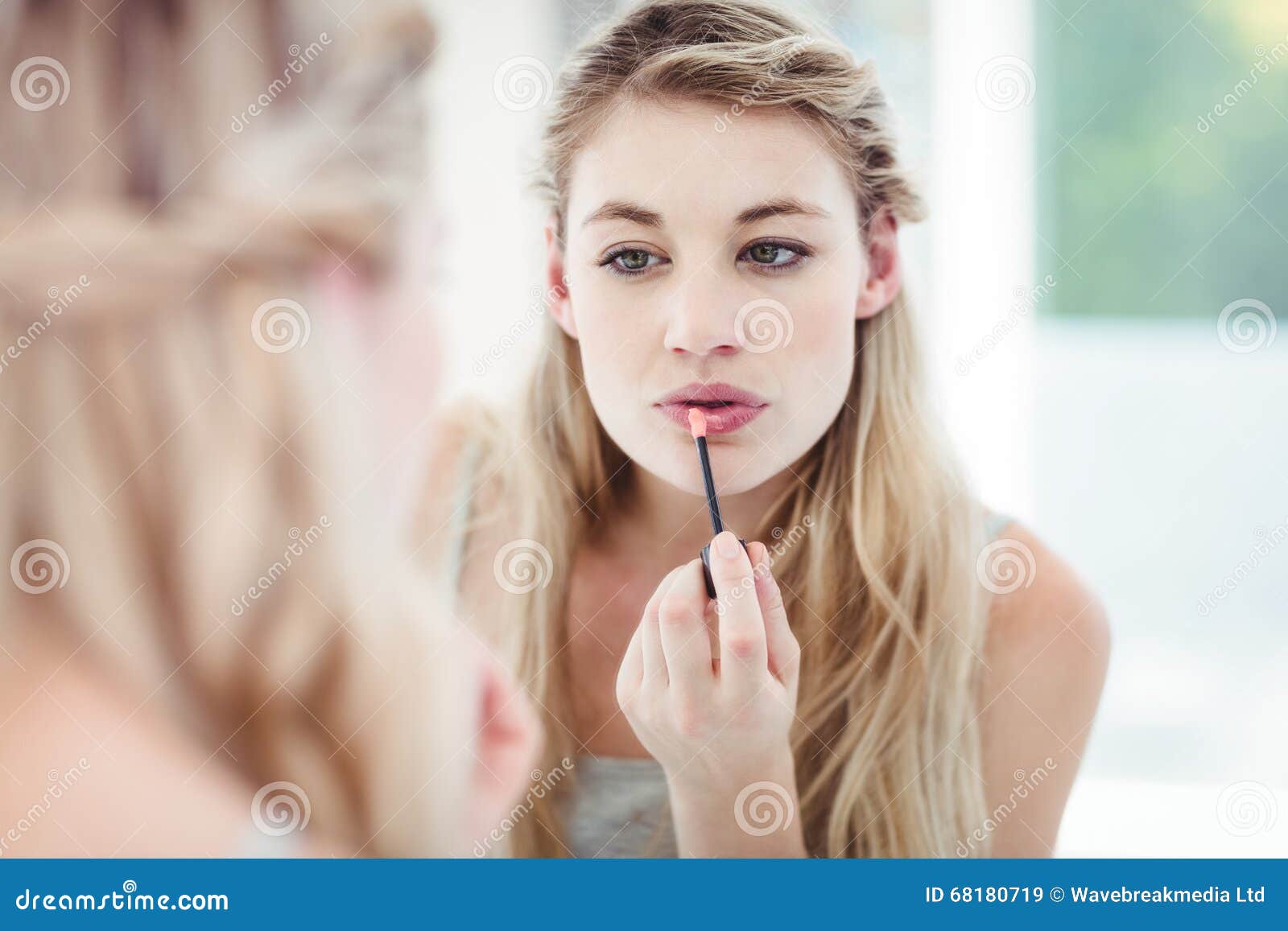 Young Woman Applying Lip Gloss Stock Image Image Of Cosmetic Focus
