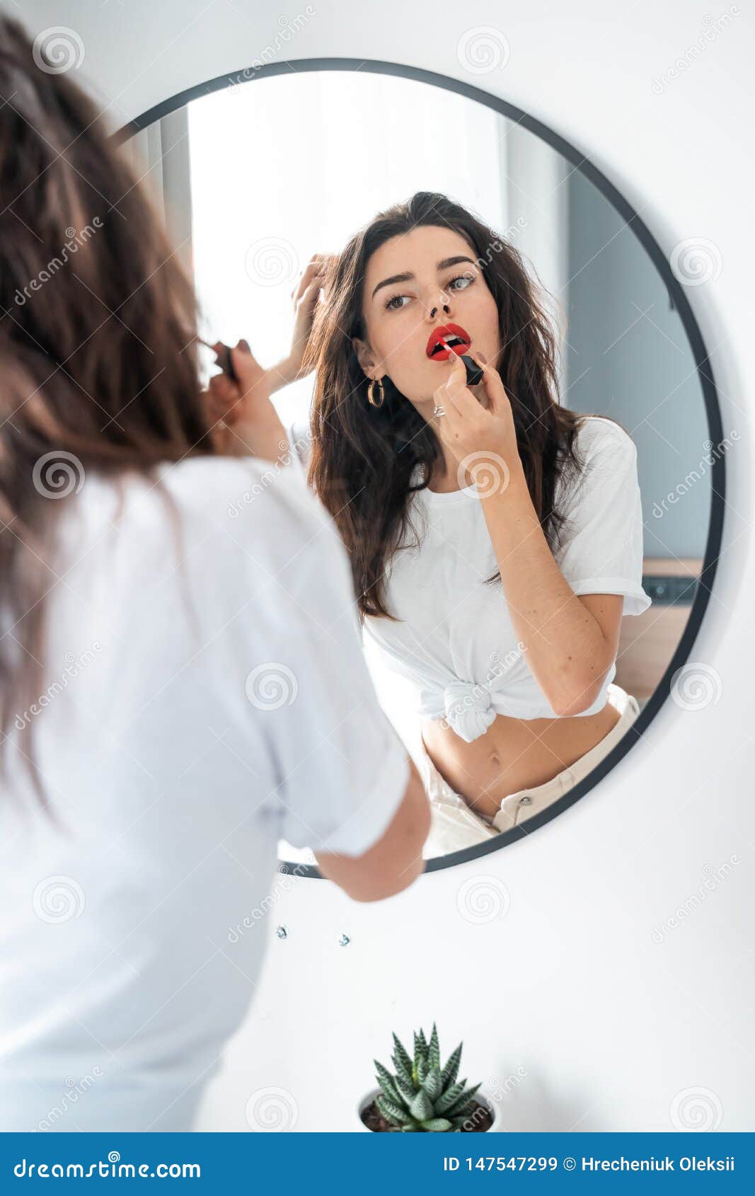 Young Woman Applying Lipstick Looking At Mirror Stock Image Image Of Applying Reflection