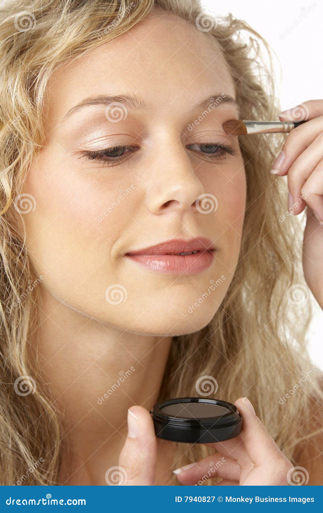 Young Woman Applying Make-Up Stock Image - Image of beauty, brush: 7940827