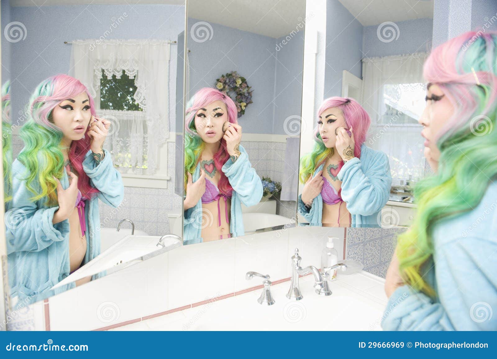 Young Woman Applying Makeup with Multiple Mirror Reflections Stock ...
