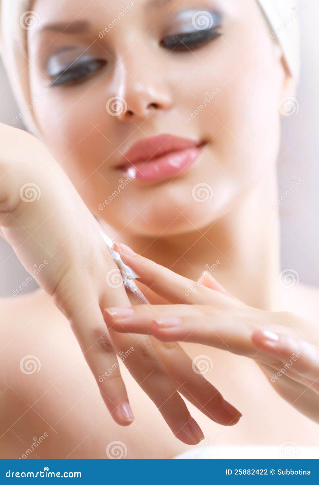 Young Woman Applying Moisturizing Cream Stock Photo - Image of cream ...