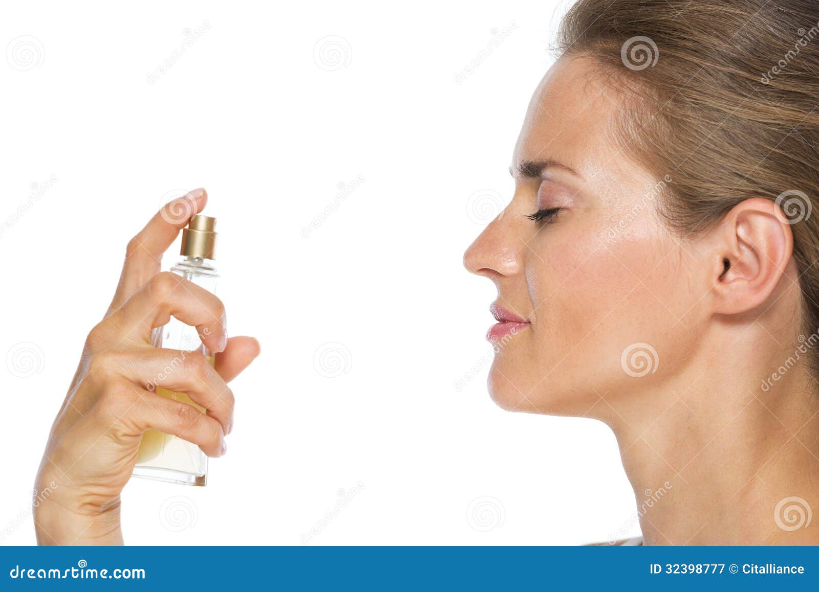 Young Woman Applying Perfume Stock Image - Image of face, fragrance ...