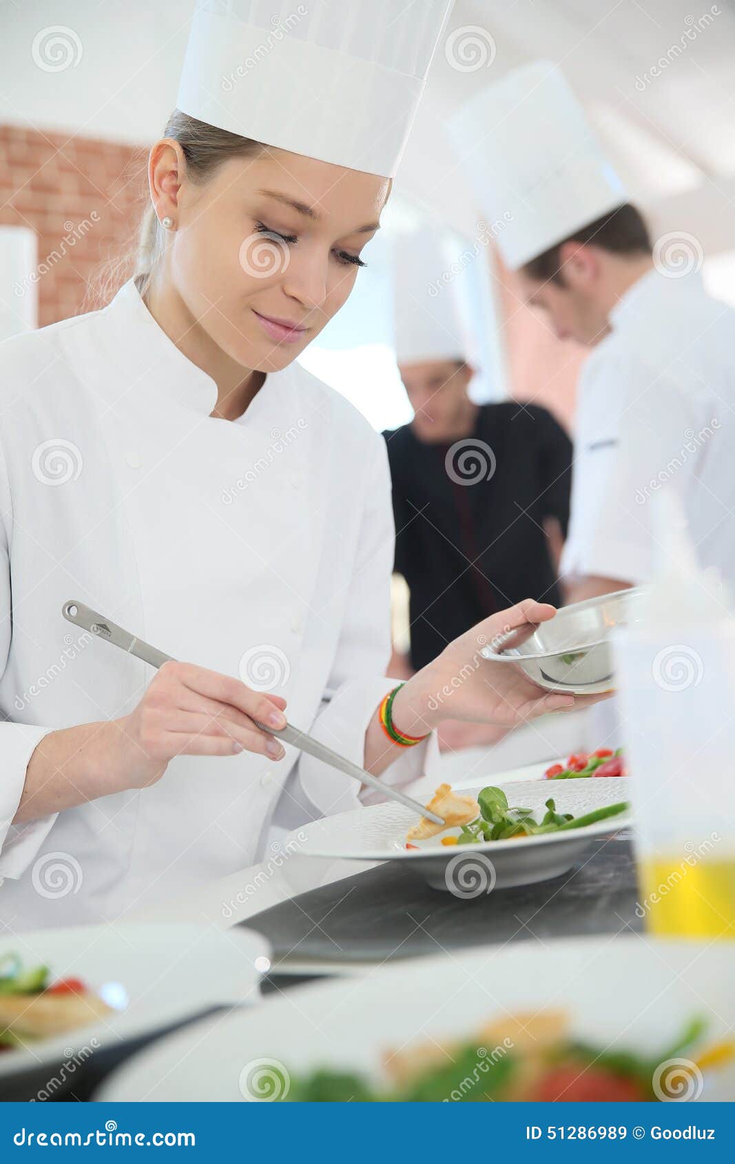 Young Woman Apprentice Decorating Dish Stock Image - Image of ...