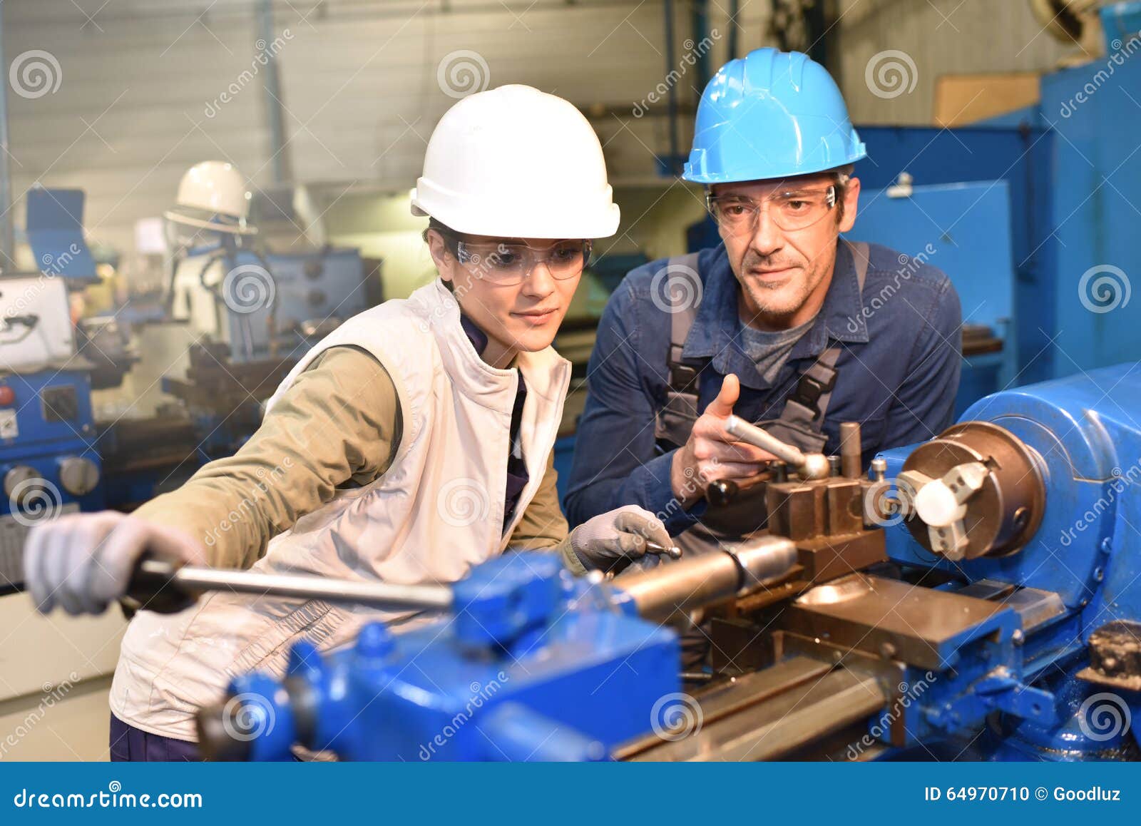Young Woman Apprentice Learning Metallurgic Work Stock Photo - Image of ...