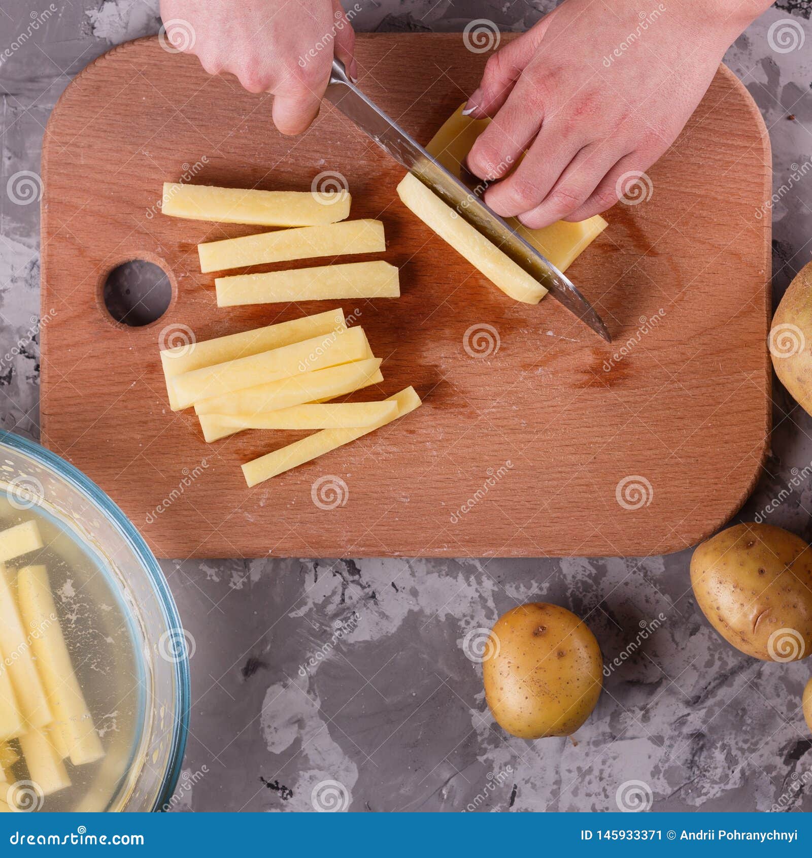 Young Woman in an Apron Cuts Potatoes Stock Image - Image of fresh ...