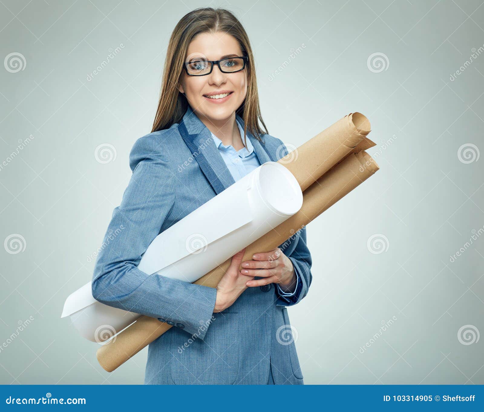 Young Woman Architect Wearing Glasses Holding Paper Blueprints. Stock ... Young Woman Architect Wearing Glasses Holding Paper Blueprints. Stock ...