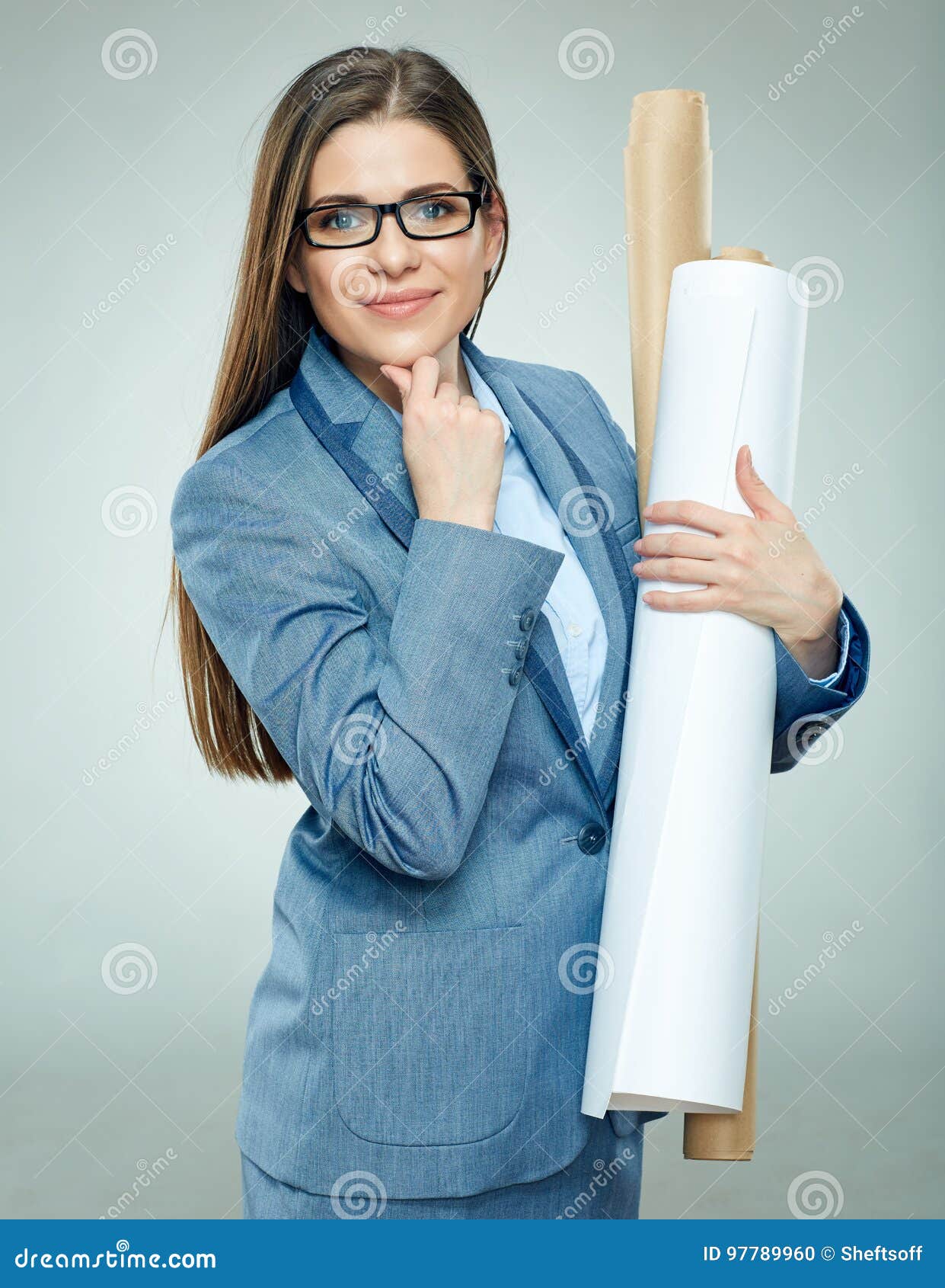 Young Woman Architect Wearing Glasses Holding Paper Blueprints. Stock ... Young Woman Architect Wearing Glasses Holding Paper Blueprints. Stock ...