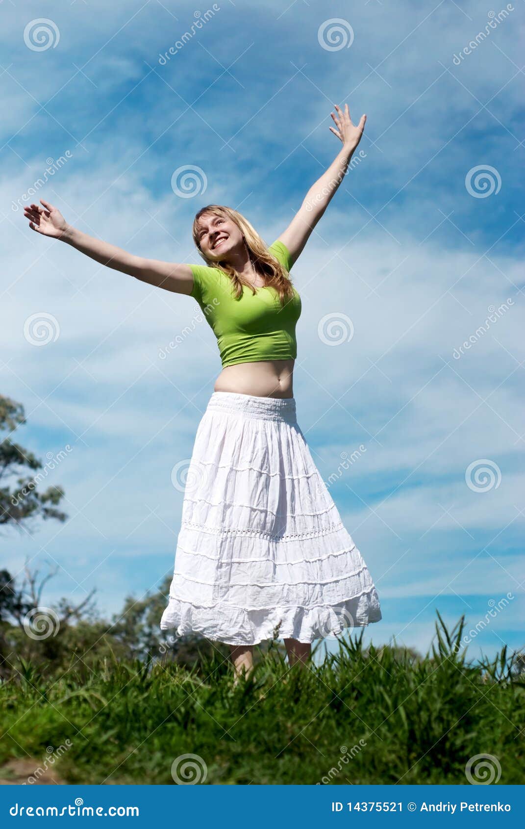 Young Woman with Arms Raised Against Nature Stock Image - Image of ...