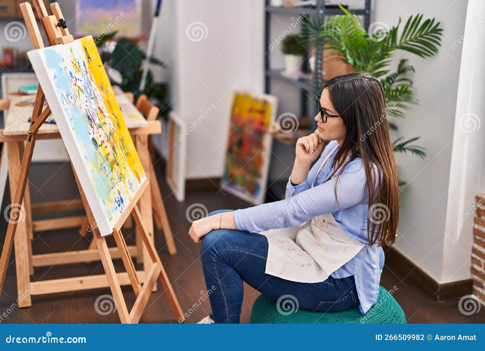 Young Woman Artist Looking Drawing at Art Studio Stock Photo - Image of ...