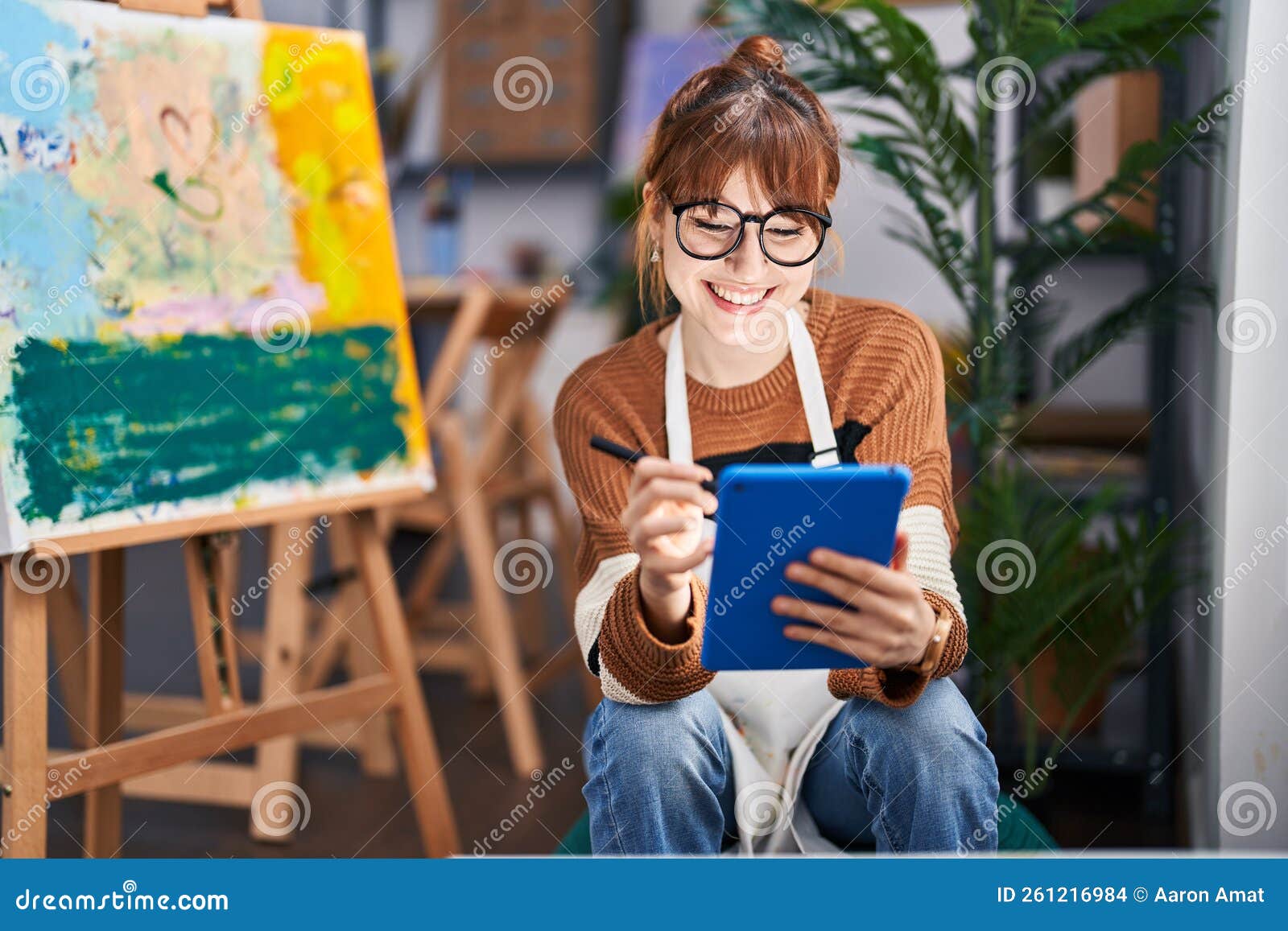 Young Woman Artist Using Touchpad at Art Studio Stock Photo - Image of ...