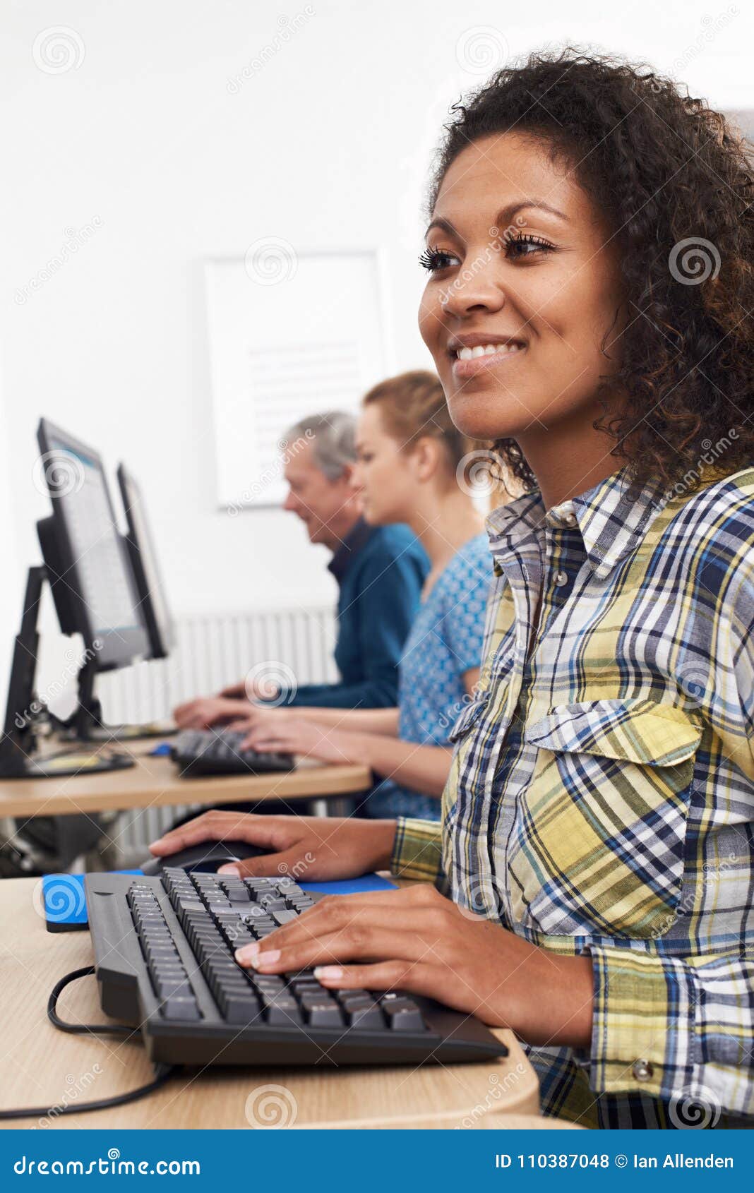 Young Woman Attending Computer Class Stock Photo - Image of campus ...