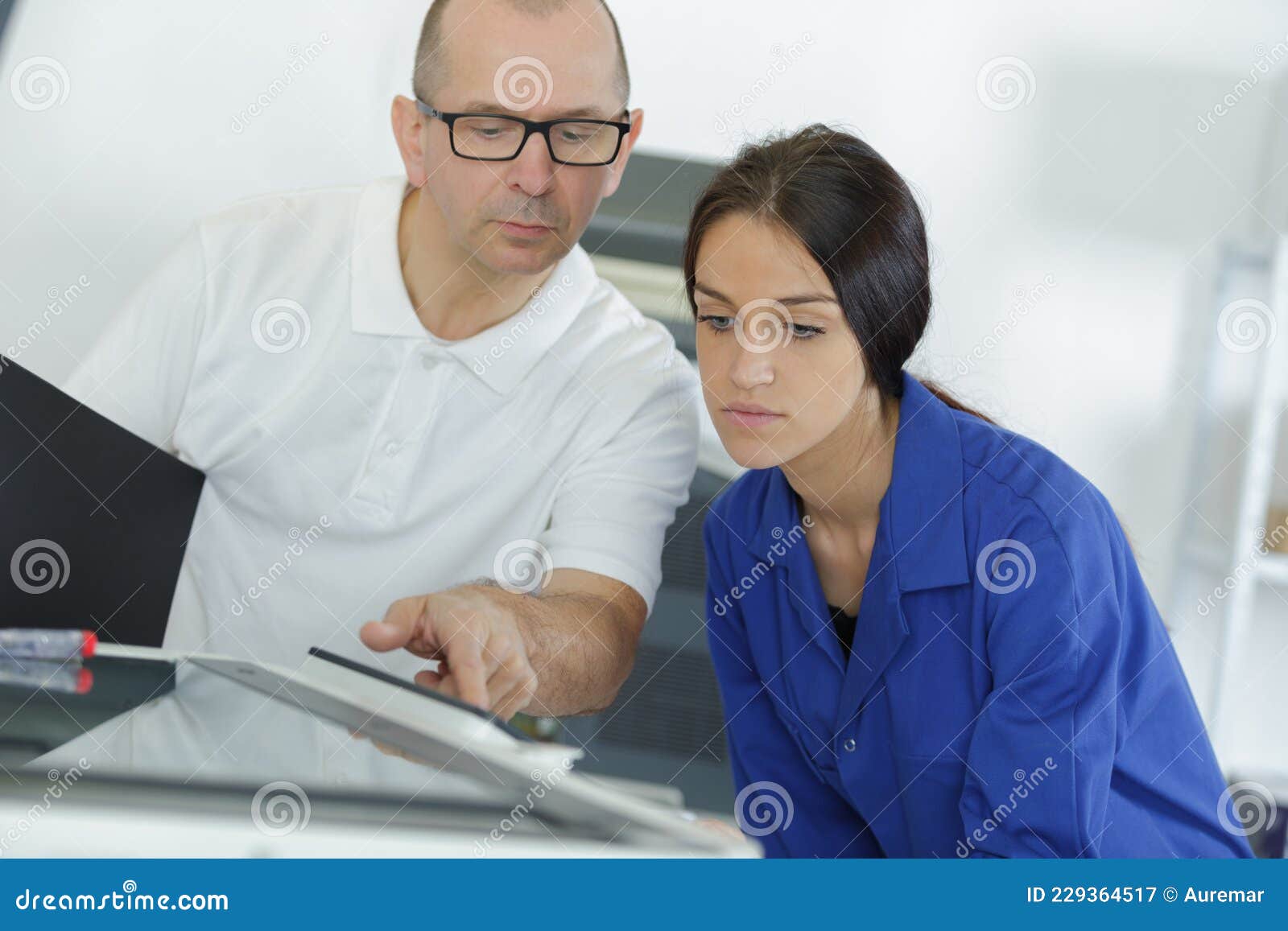 Young Woman in Auto Mechanics Training Class Stock Image - Image of ...