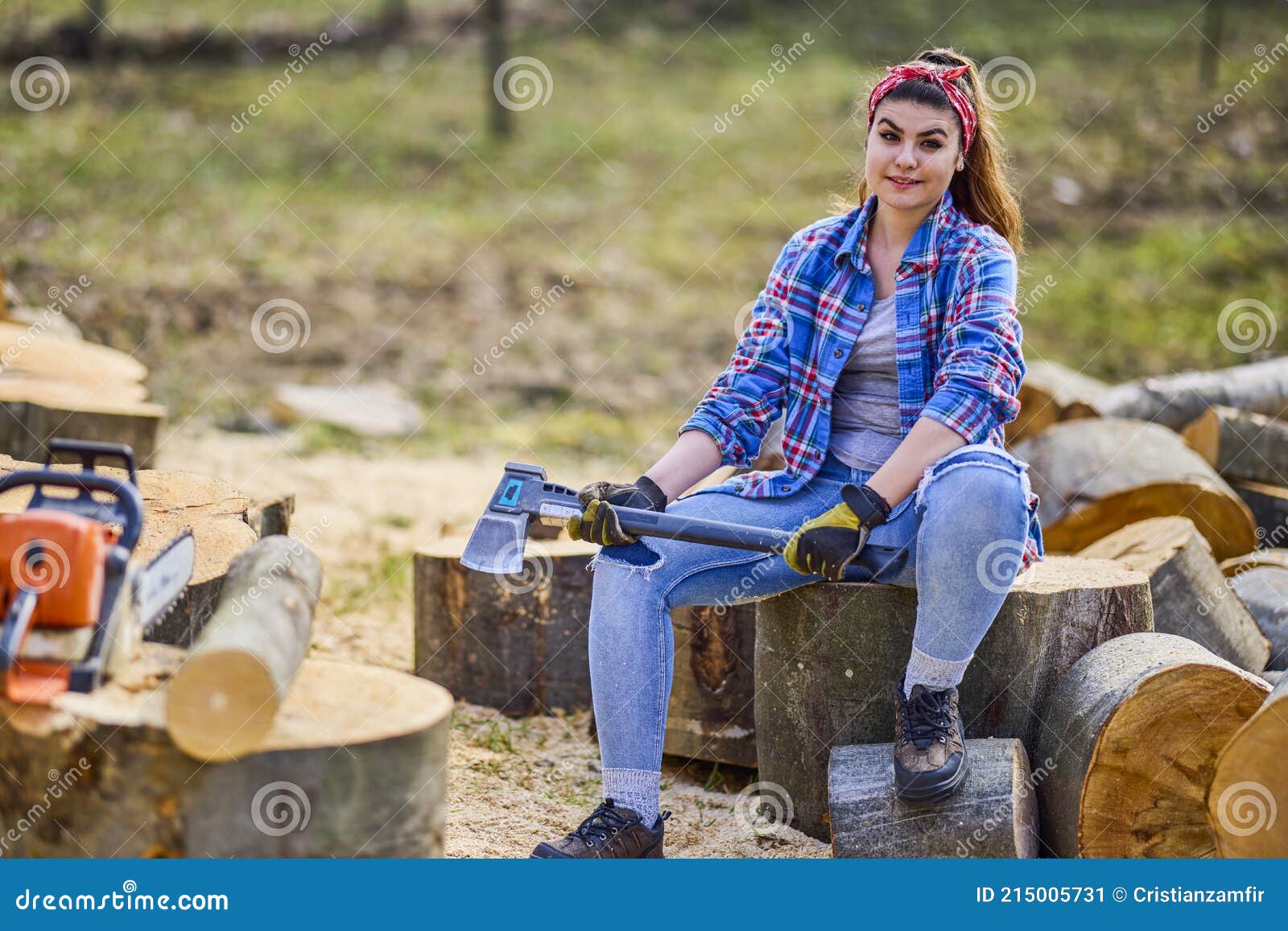 Woman Woodcutter Rests on a Log Stock Image - Image of smiling ...