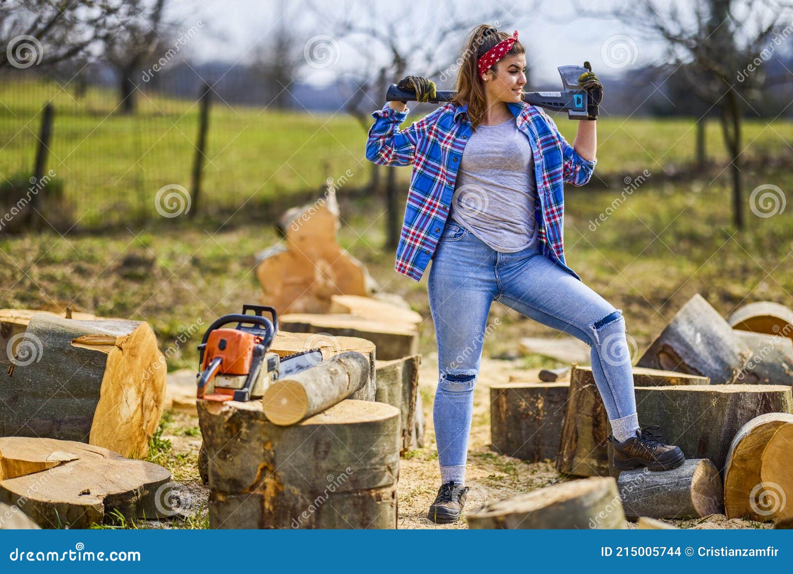 Woman Woodcutter Rests on a Log Stock Photo - Image of strong, woman ...