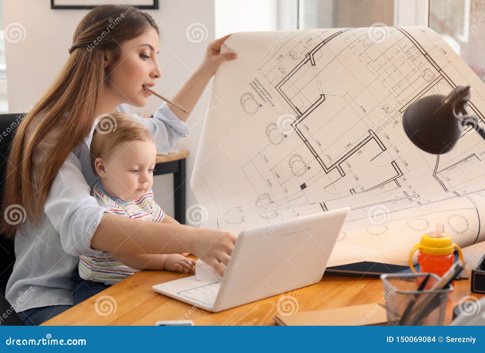 Young Woman with Baby Working in Office Stock Photo - Image of internet ...