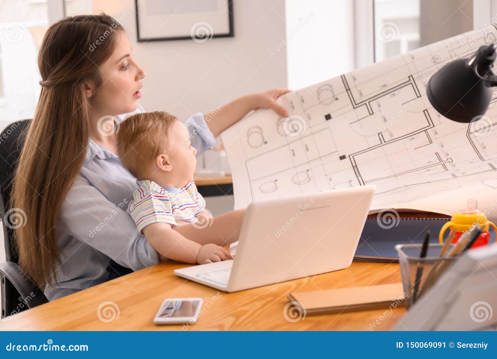 Young Woman with Baby Working in Office Stock Image - Image of network ...