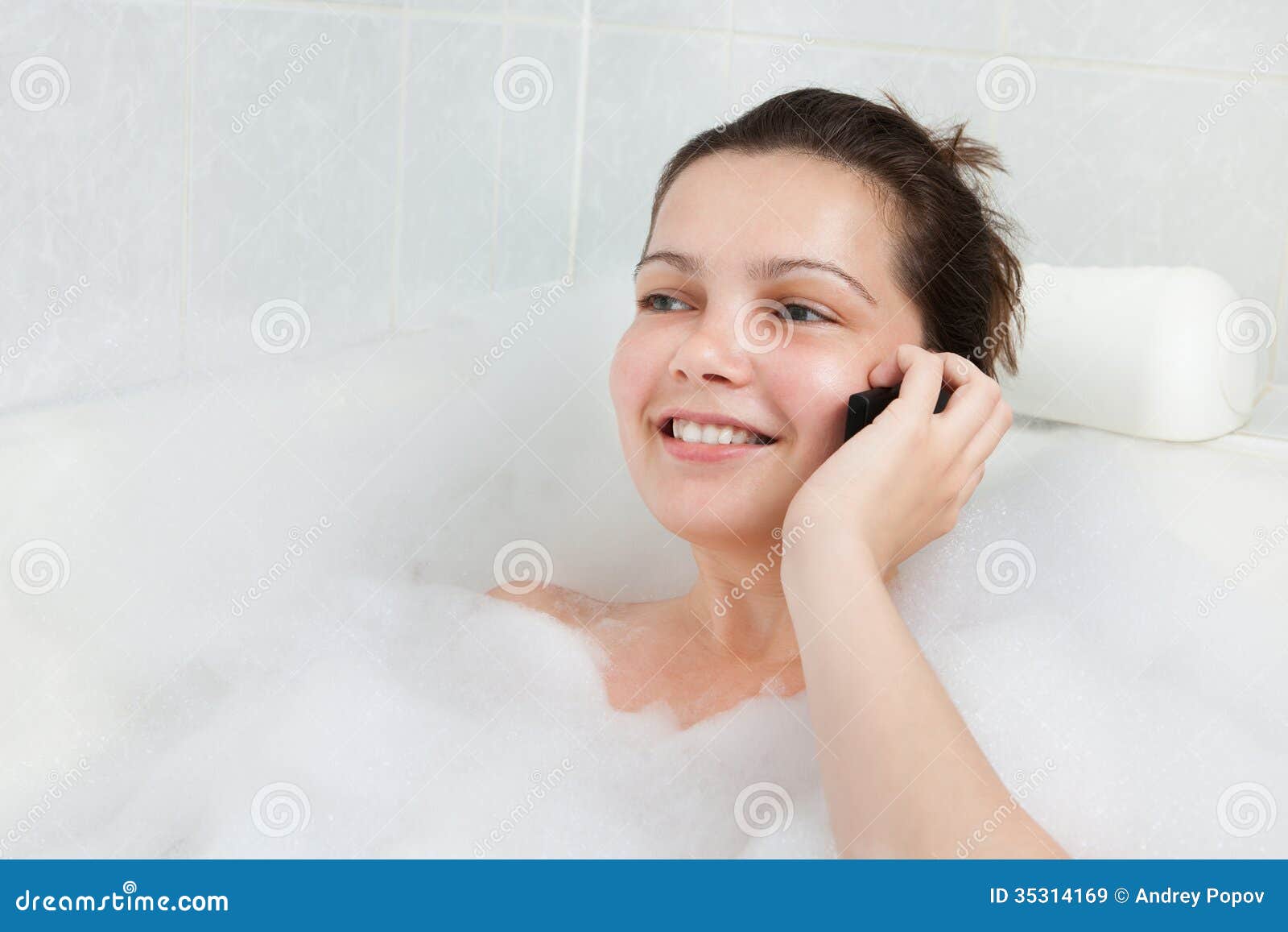 Young Woman in Bathtub Talking on Mobile Stock Image - Image of leisure ...