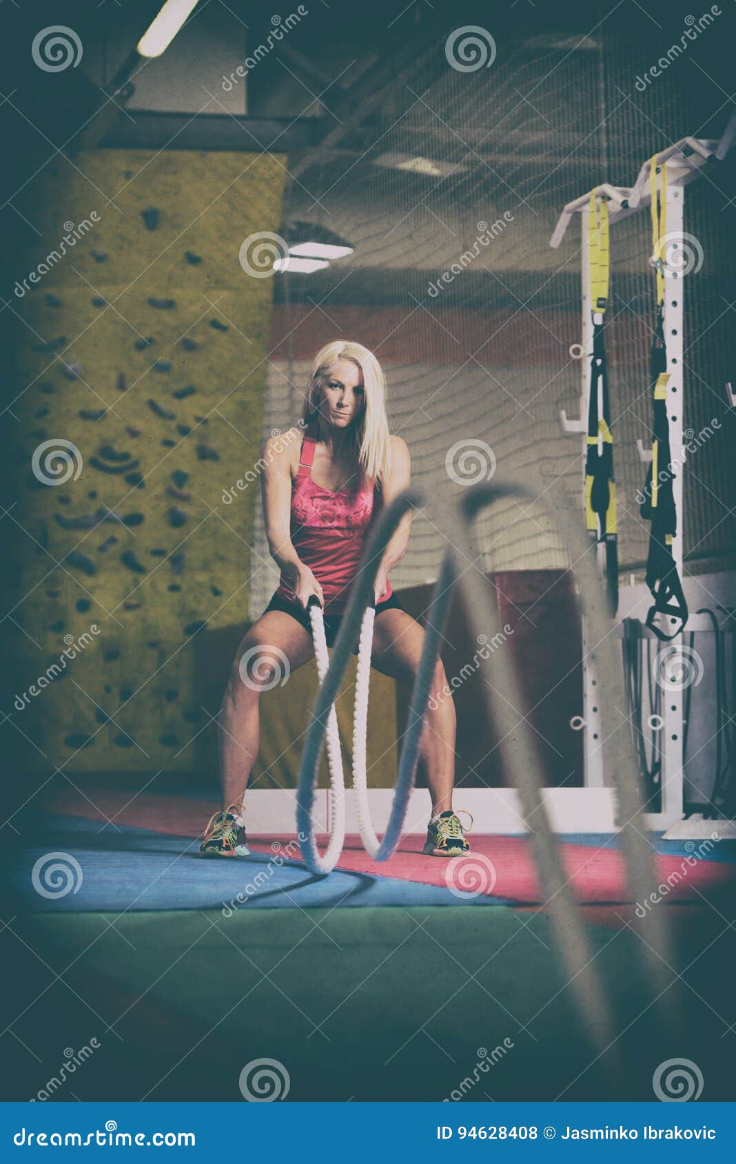Young Woman Battling Ropes at Gym Workout Exercise Stock Photo - Image ...