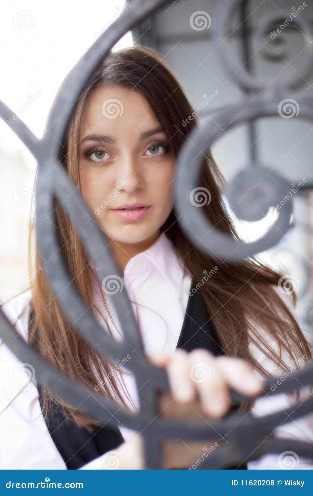 Young Woman Behind Metal Wire Stock Photo - Image of face, person: 11620208