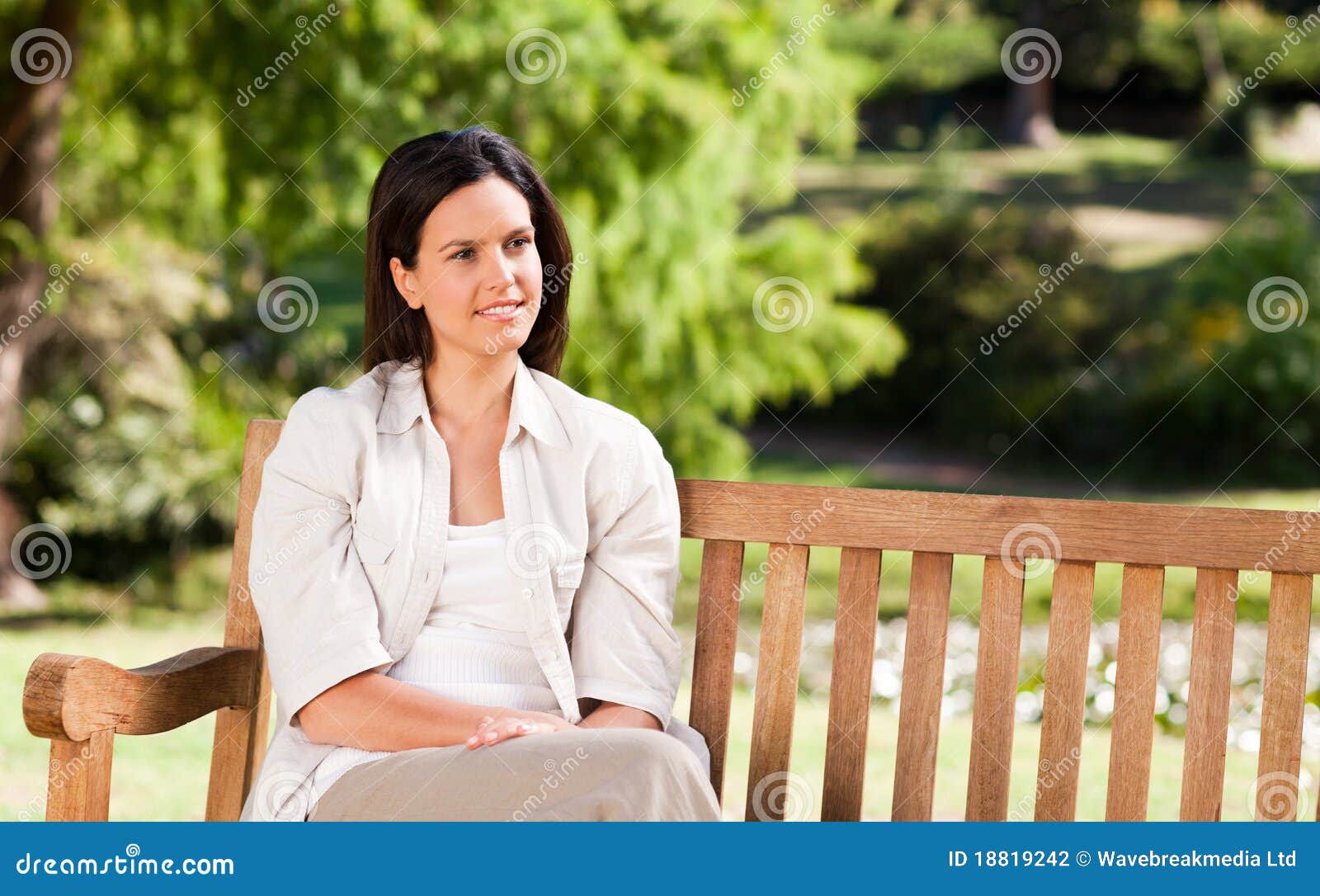 Young woman on the bench stock photo. Image of relax - 18819242