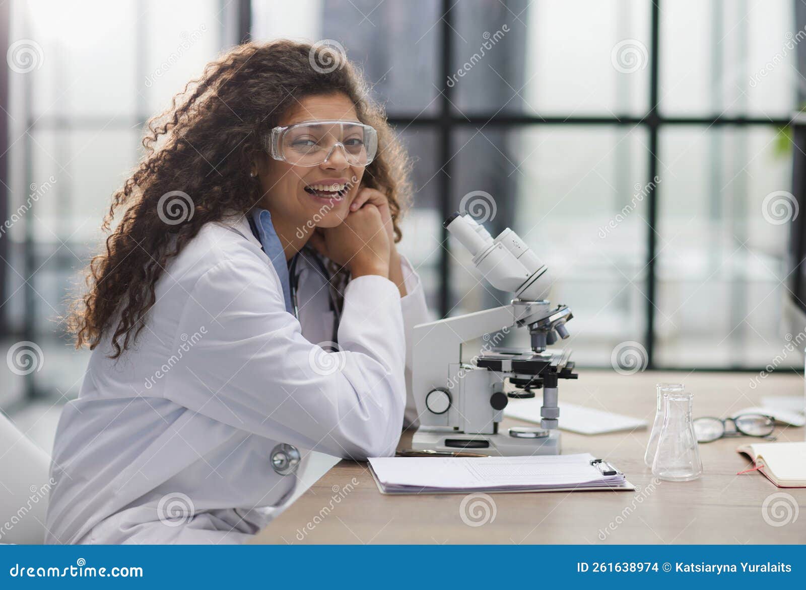 Young Woman in Biological Laboratory. Attractive Young Female Scientis ...