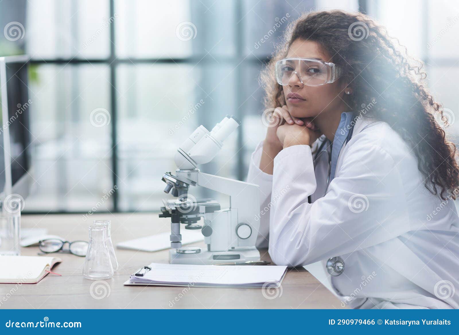 Young Woman in Biological Laboratory. Attractive Young Female Scientis ...
