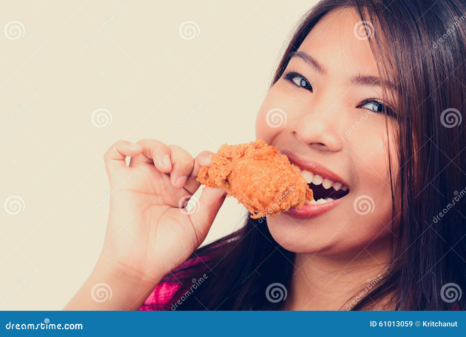 Young Woman Biting Fried Chicken Stock Image - Image of happy, people ...