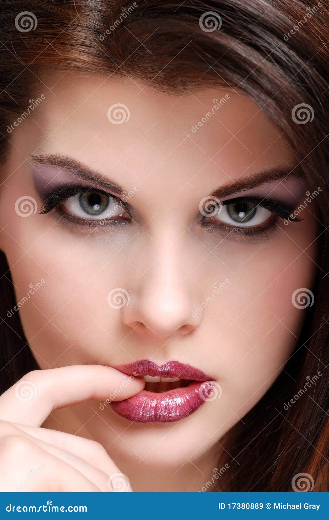 Young Woman Biting Her Finger Stock Image - Image of lovely, biting ...