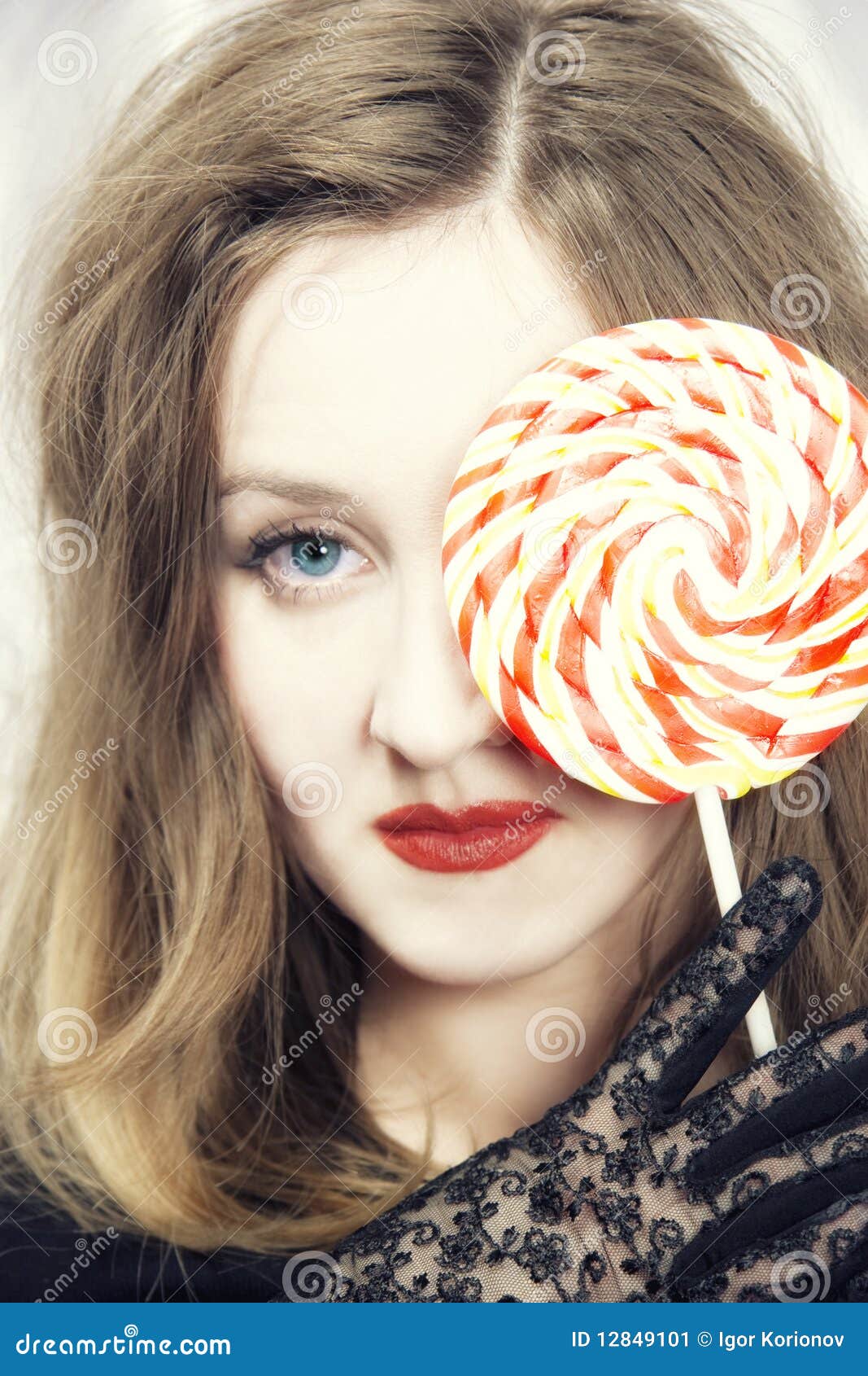Young Woman Biting Sugar Candy Stock Image - Image of sweet, bite: 12849101