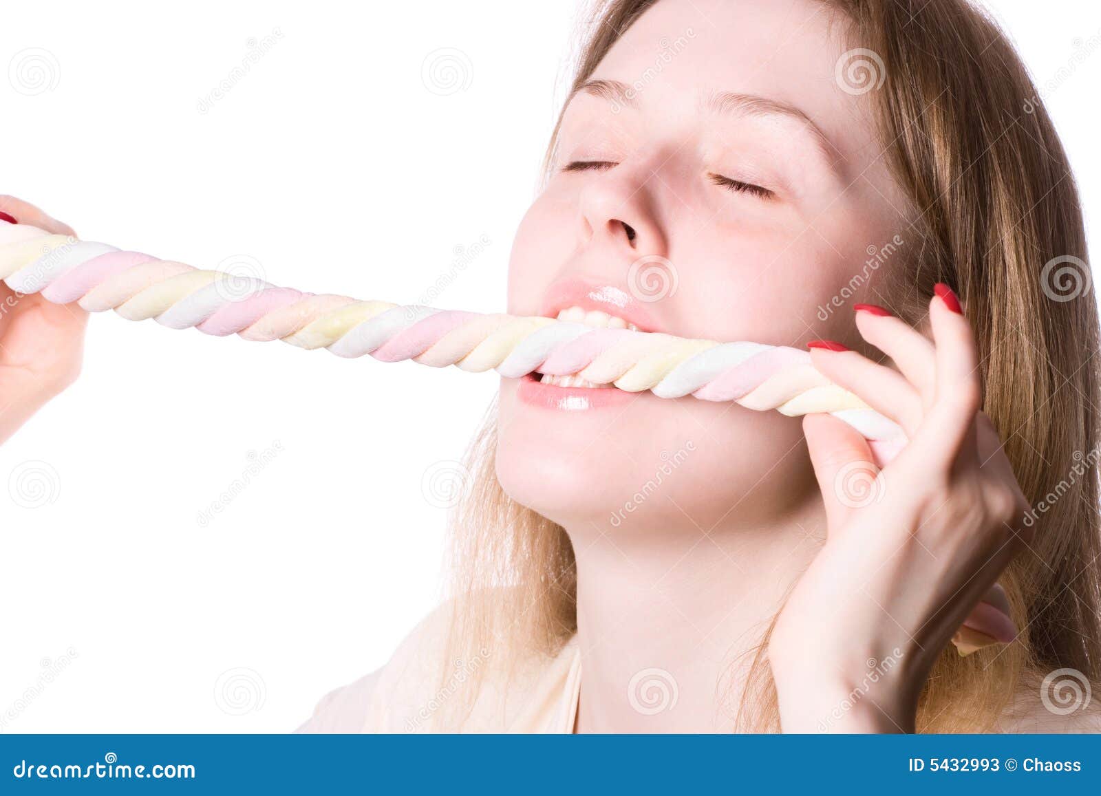Young woman biting sweets stock image. Image of isolated - 5432993