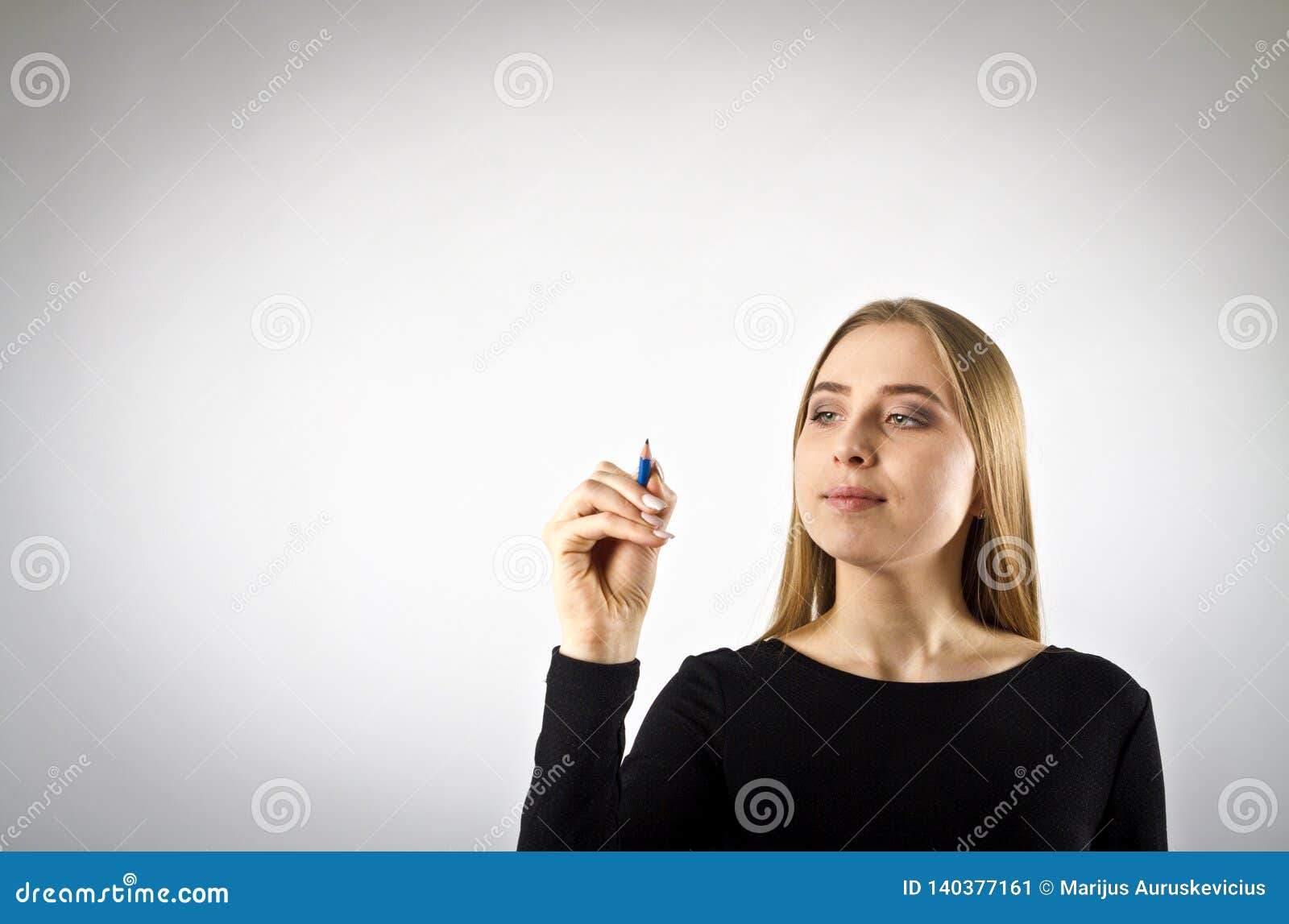 Young Woman in Black is Writing Stock Image - Image of looking ...