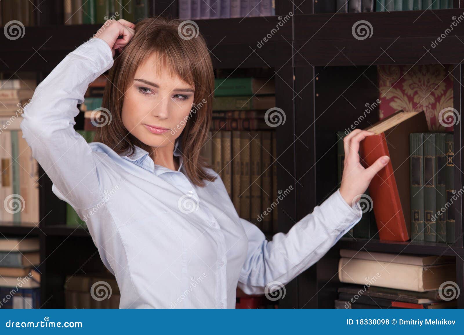 Young Woman with Book in Library. Stock Photo - Image of book, clever ...