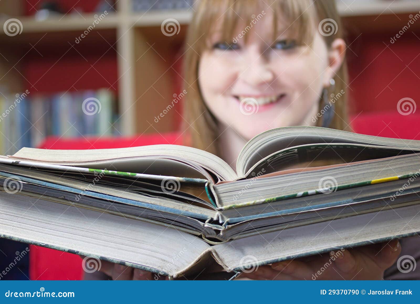 Young Woman with Books in Library Stock Photo - Image of hand ...