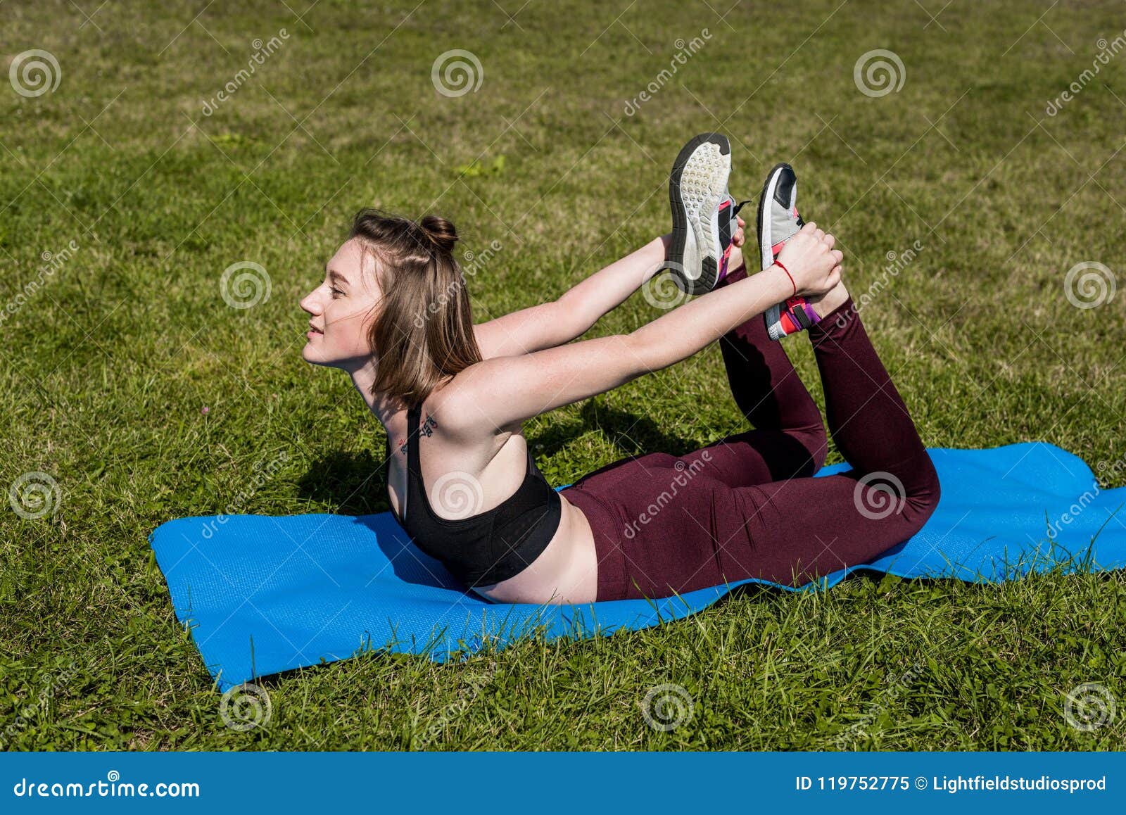 Young Woman in Bow Pose Practicing Stock Image - Image of female ...