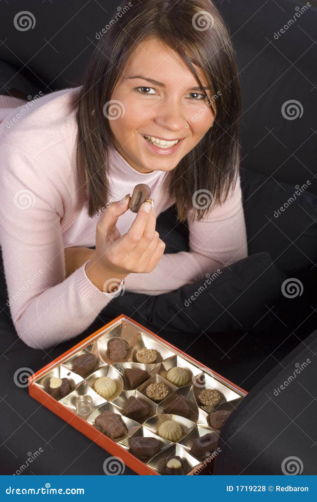 Young Woman with Box of Chocolates Stock Photo - Image of enjoyment ...