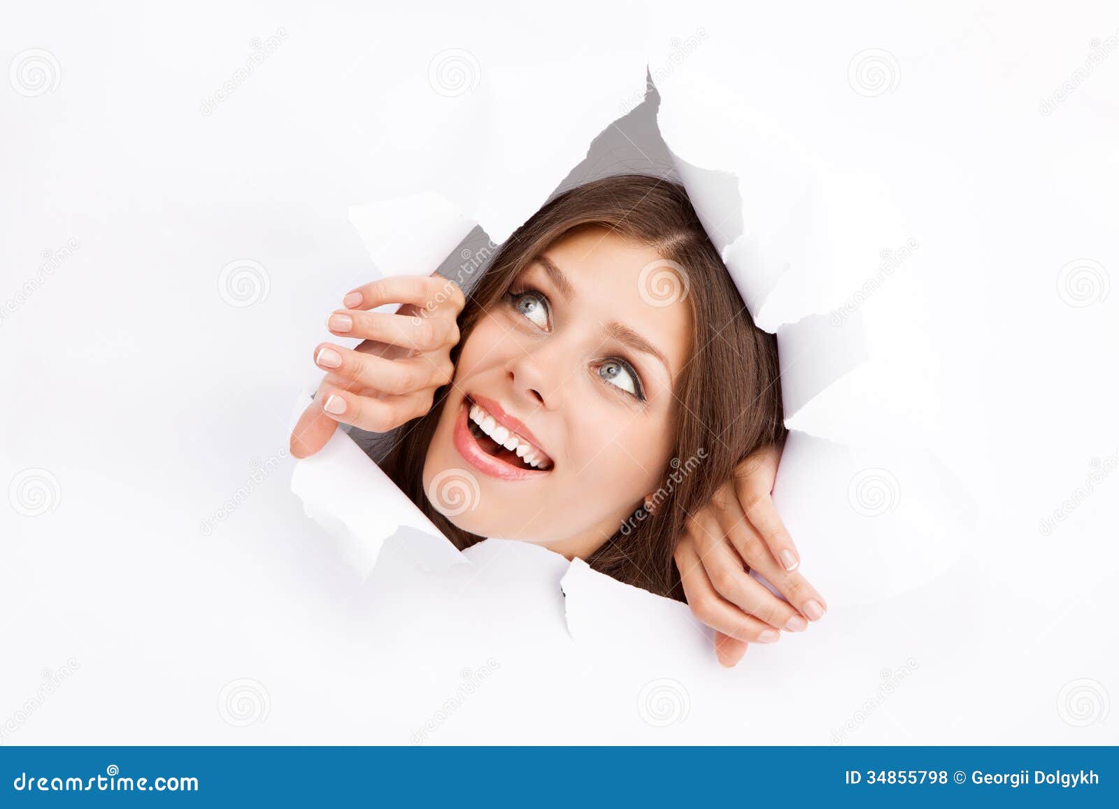 Young Woman Breaking through a Paper Sheet Stock Photo - Image of ...