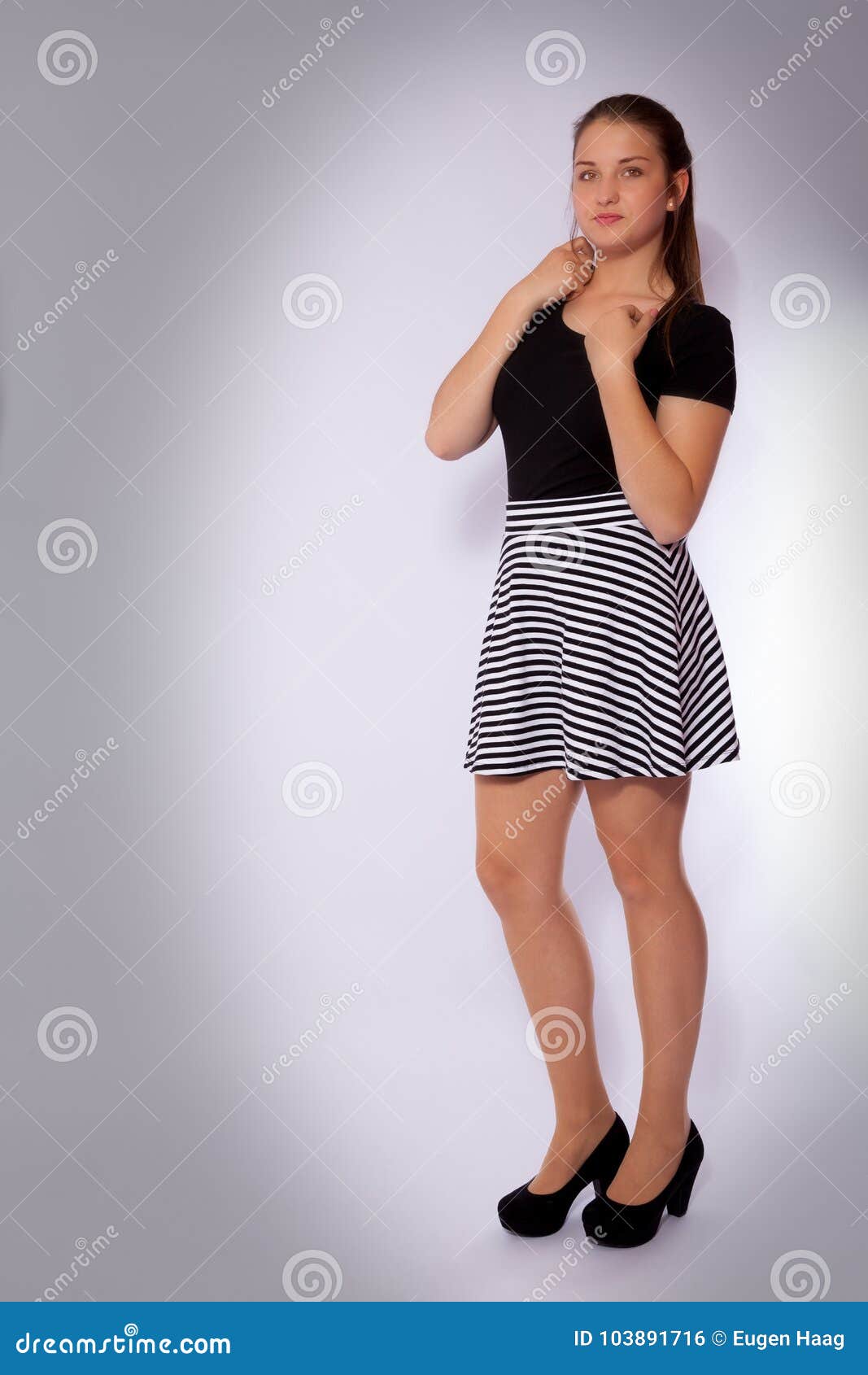 Young Woman is Standing and Posing Stock Photo - Image of person, full ... Young Woman is Standing and Posing Stock Photo - Image of person, full ...
