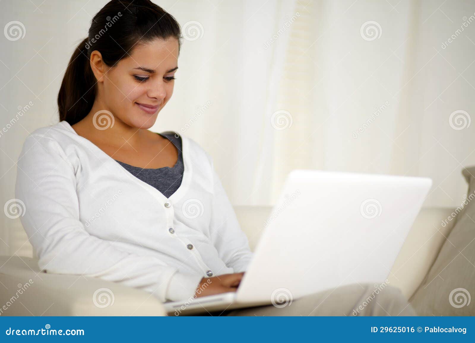 Young Woman Browsing the Internet on Laptop Stock Photo - Image of lady ...