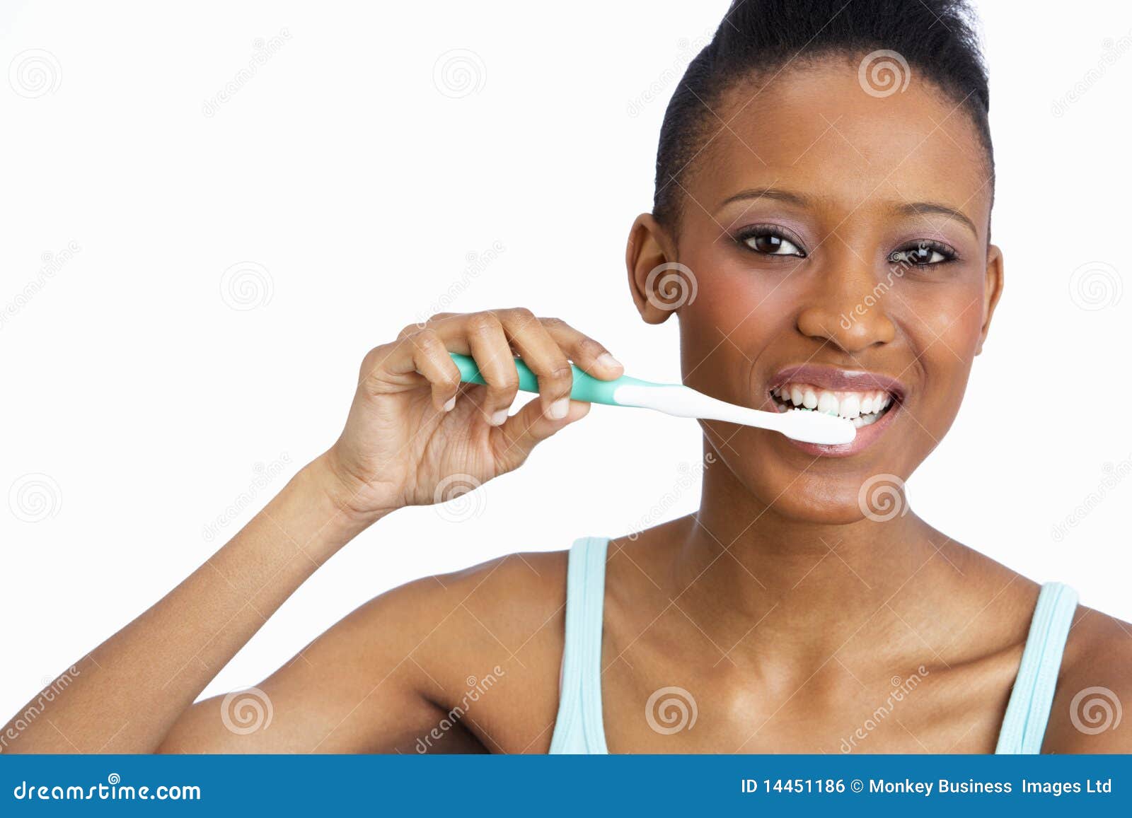 Young Woman Brushing Teeth in Studio Stock Photo - Image of happy ...