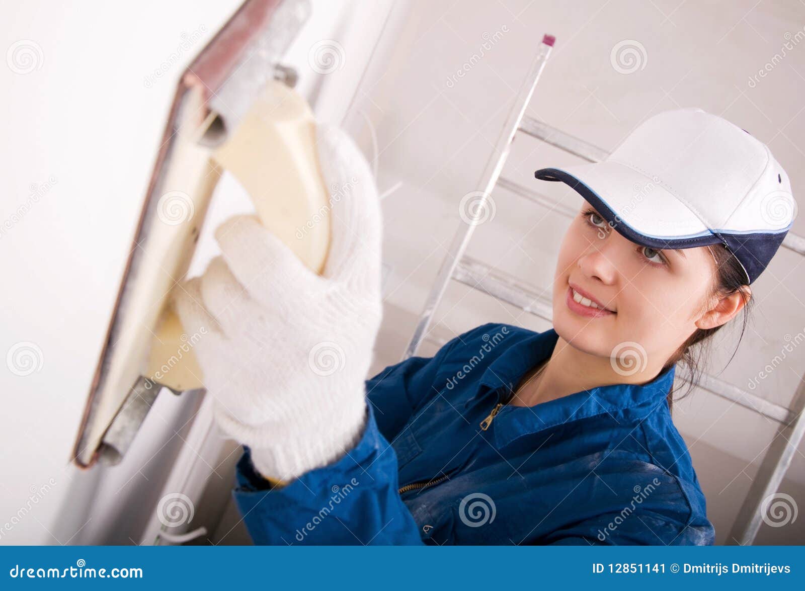 Young Woman Builder Polishing the Wall Stock Image - Image of master ...
